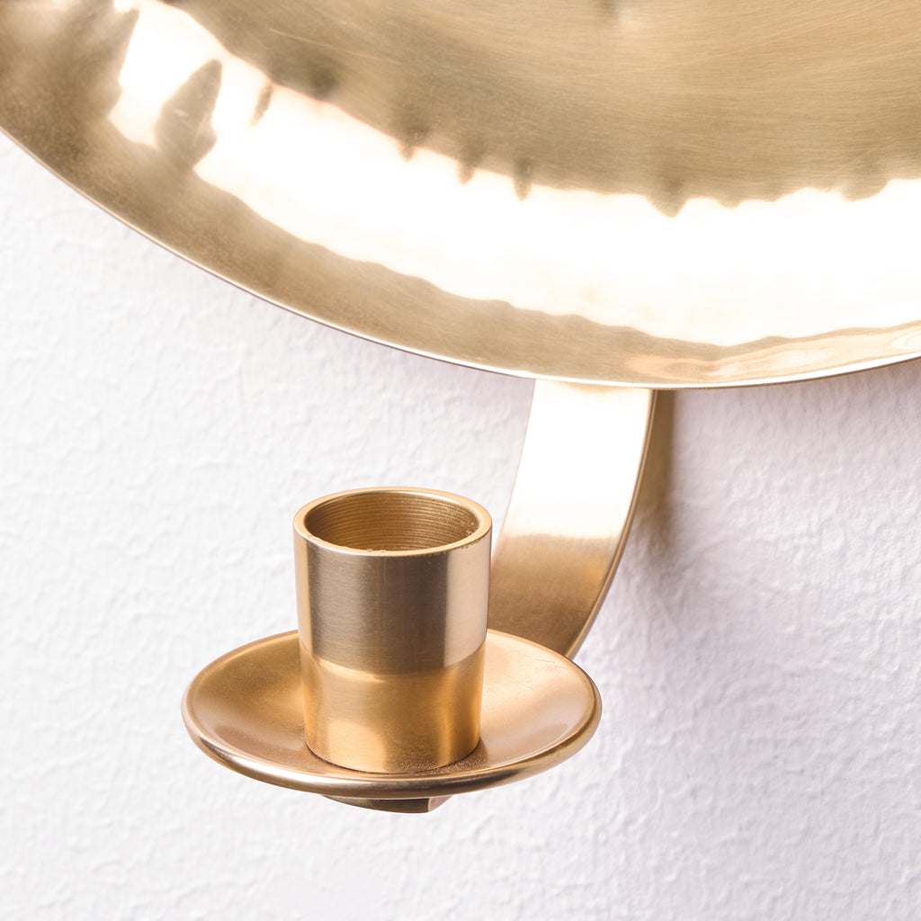Bellamy candle sconce in brass by the Novogratz