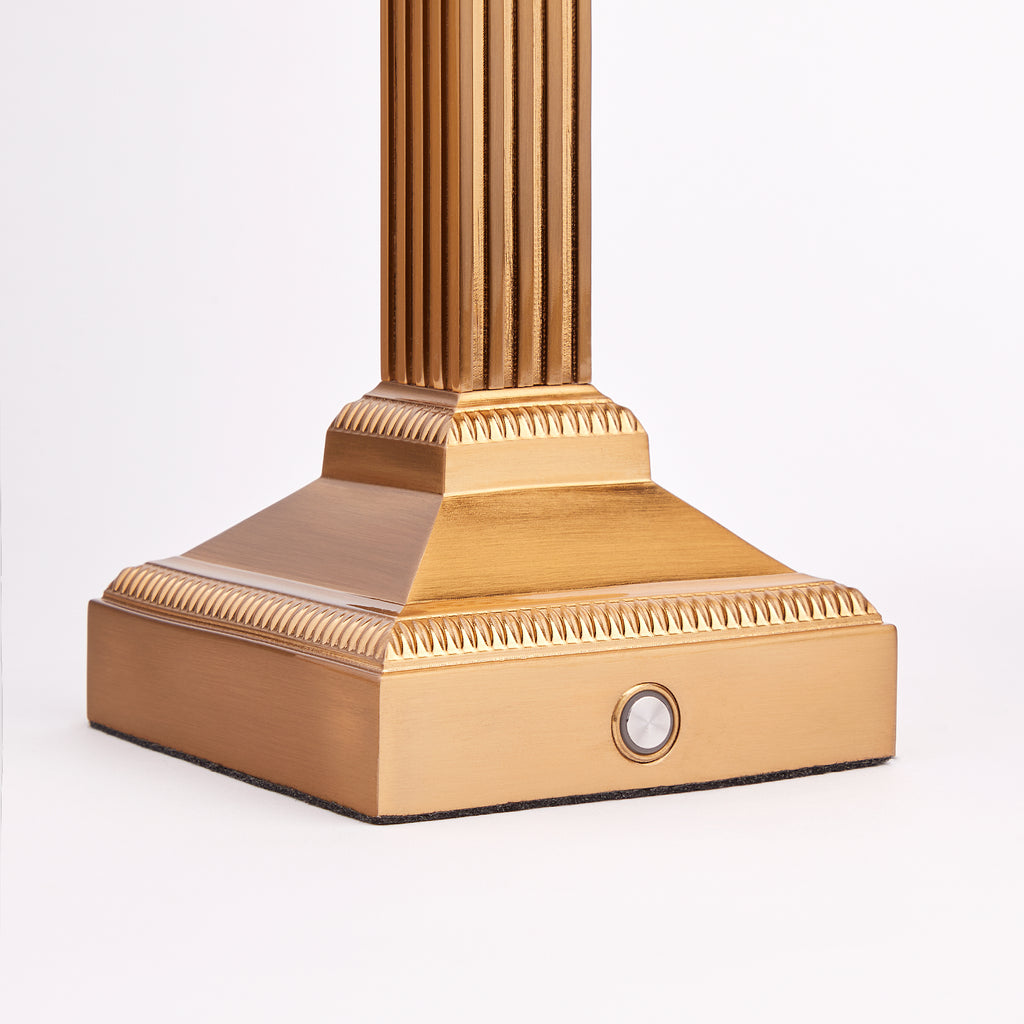 Freya cordless table lamp in antiqued brass