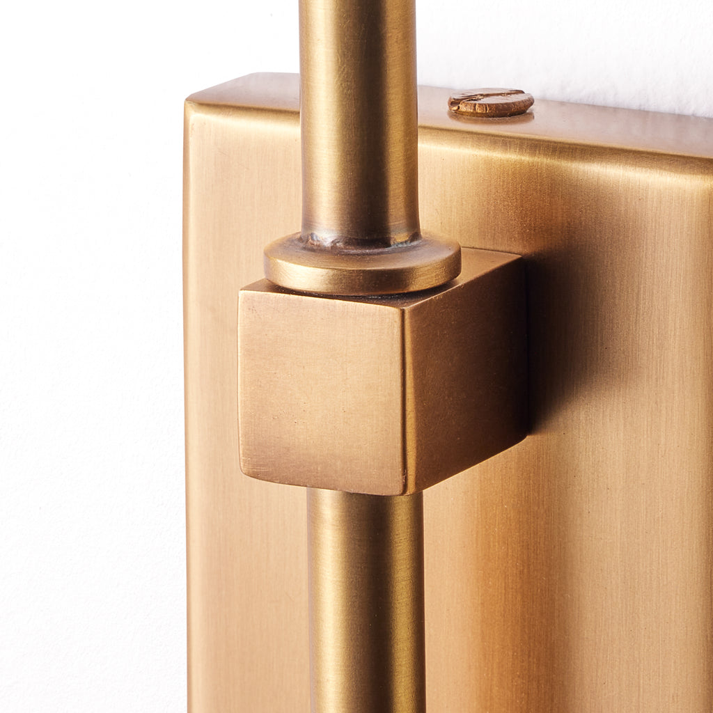 Carter Wall fixture in antiqued Brass