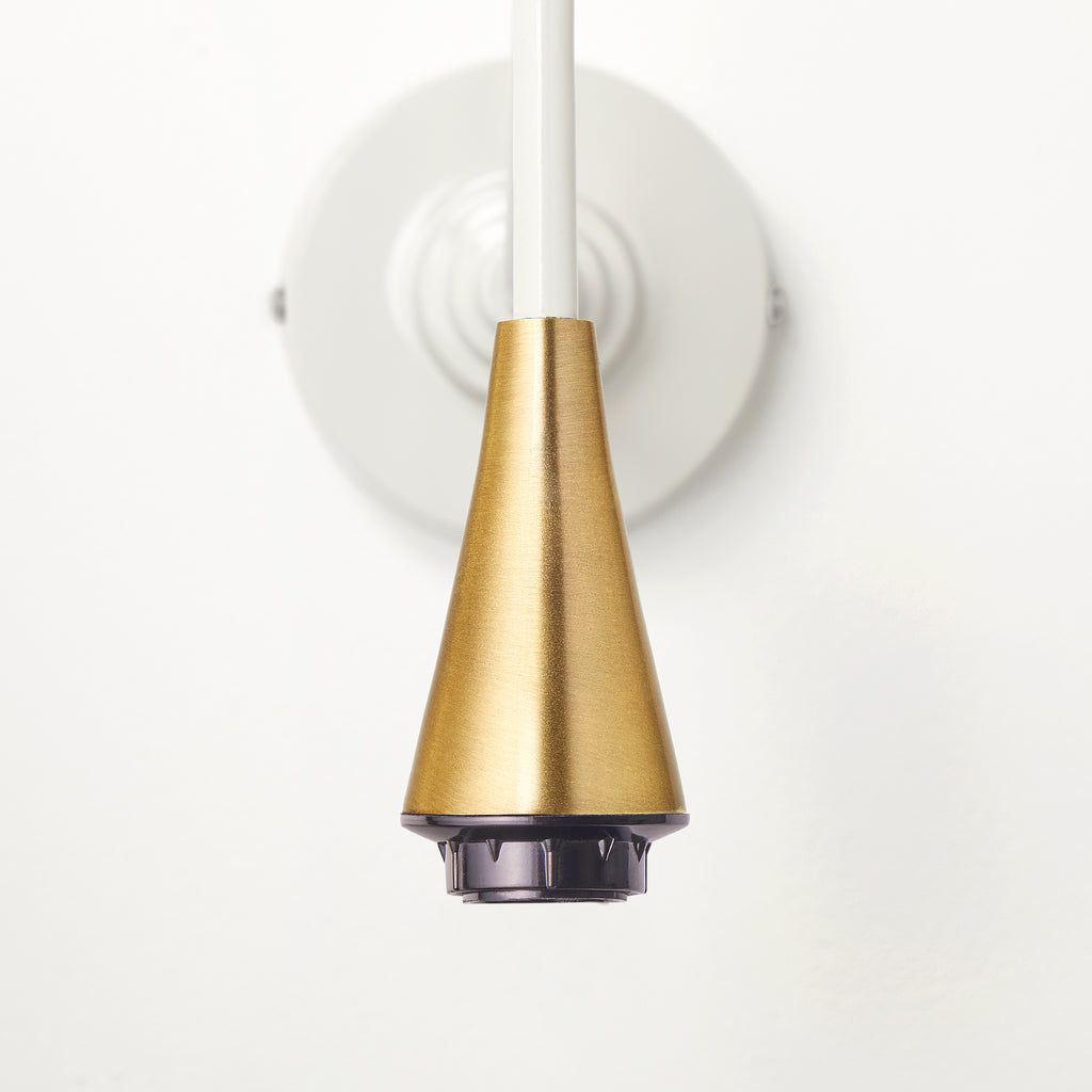 Cone wall fixture in stone