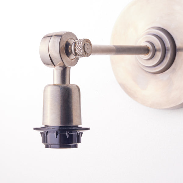 Elbow wall fixture in antiqued silver