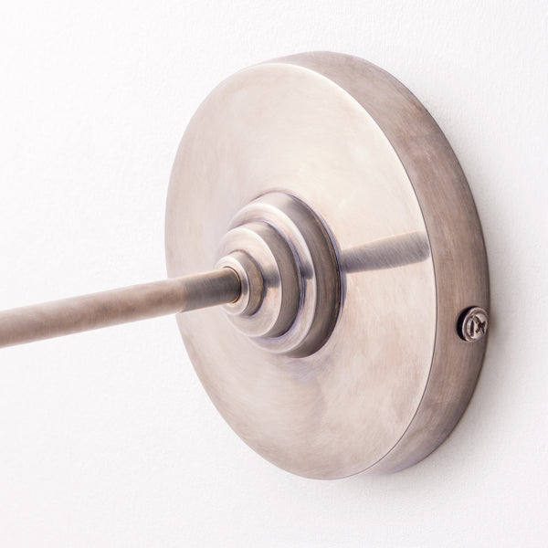 Elbow wall fixture in antiqued silver