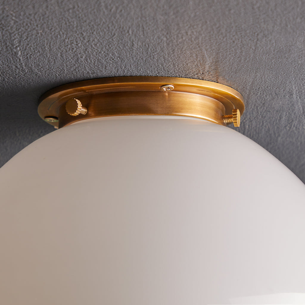 Larger Plumb flush mount fixture in antiqued brass Larger Plumb flush mount fixture in antiqued brass