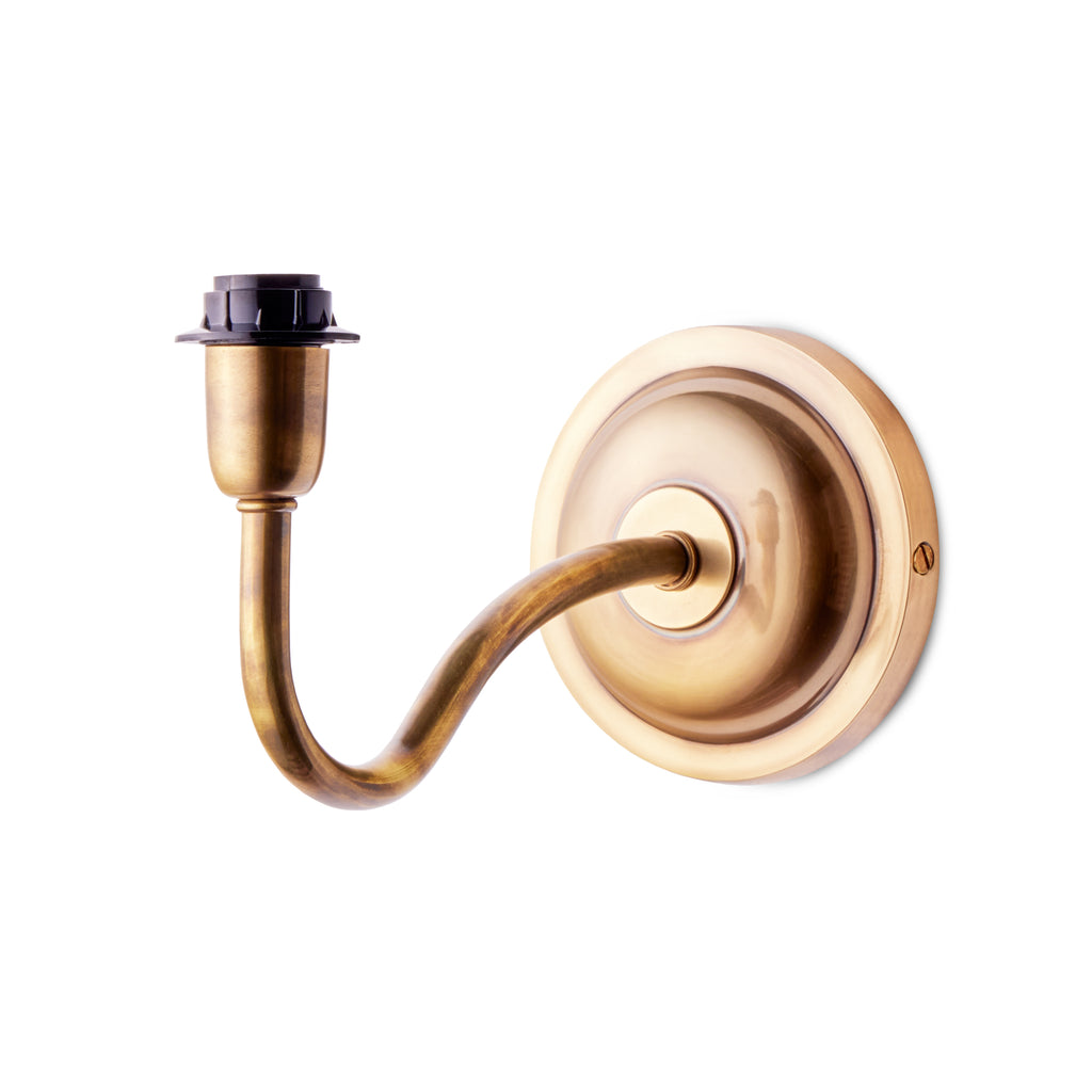 Swan neck wall fixture in antiqued brass