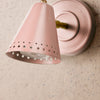 Brandy wall sconce in Blush by the Novogratz