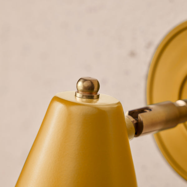 Brandy wall sconce in Sand by the Novogratz