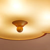 Clover flush mount ceiling light in antiqued brass with glass rods