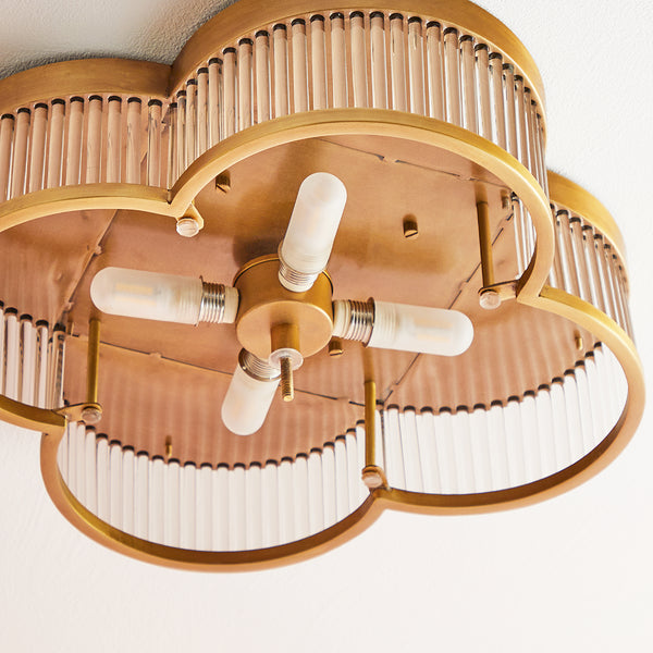 Clover flush mount ceiling light in antiqued brass with glass rods