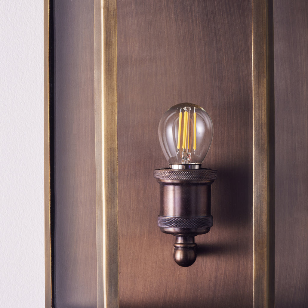 Cromer wall sconce in bronze