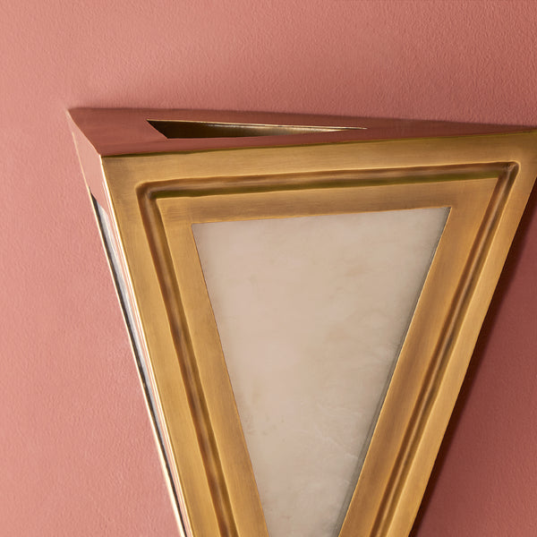 Cyrus wall sconce in antiqued brass