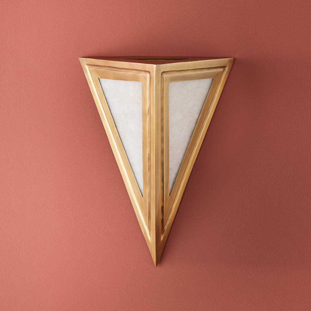 Cyrus wall sconce in antiqued brass