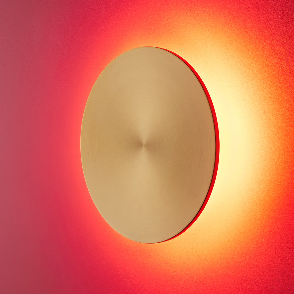 Larger Helios wall sconce in brushed gold