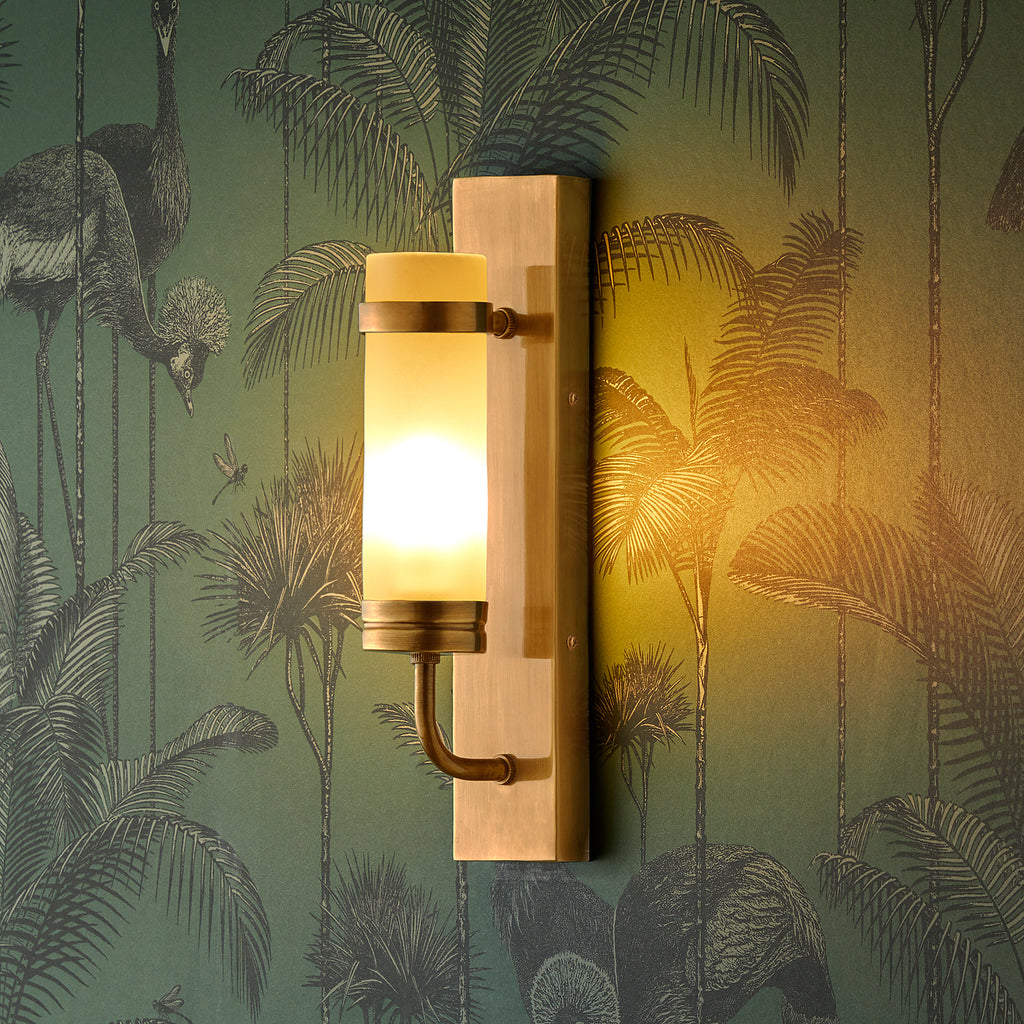 Jim wall sconce in antiqued brass and frosted glass