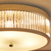 Round Roddy flush mount ceiling light in nickel and clear glass