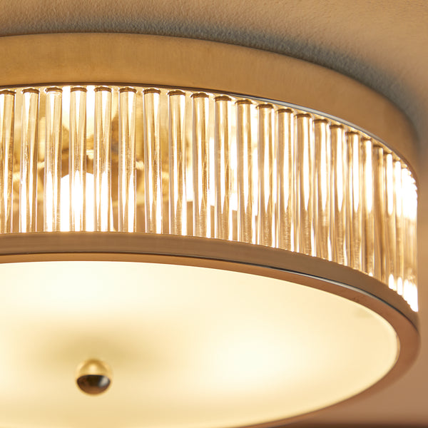 Round Roddy flush mount ceiling light in nickel and clear glass
