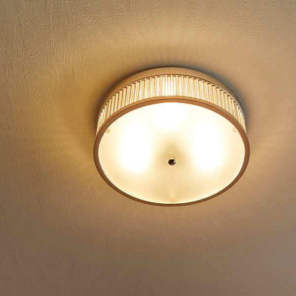 Round Roddy flush mount ceiling light in nickel and clear glass