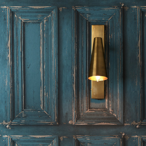 Victor wall sconce in antiqued brass