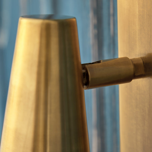 Victor wall sconce in antiqued brass
